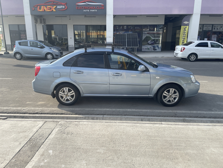 lacetti 1.8 sotiladi gazi bor 2011 yil