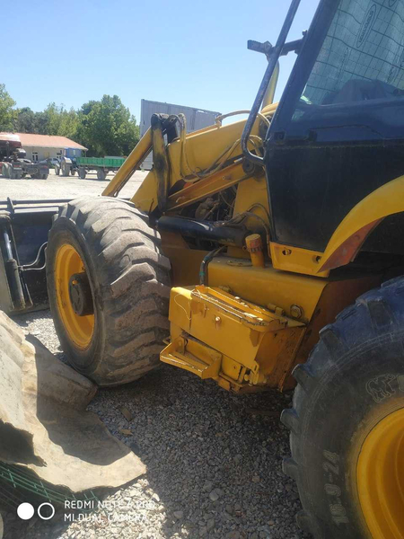 Экскаватор погрузчик JCB 4CX 14H2WM