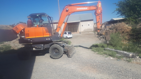 экскаватор doosan 55w  калёсный мини сотилади
