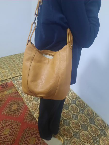 Kiyimlar sumkalar