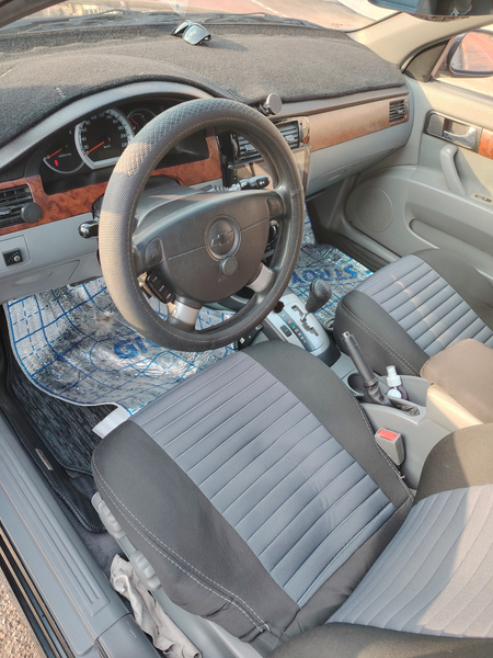Продаю свою ласточку Ласетти 1.8 автомат
