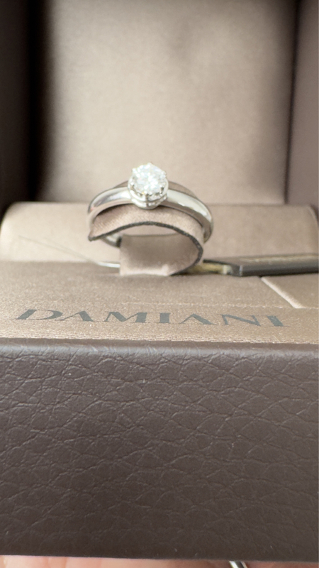 обручально кольцо Damiani с брильянтом 0,5 карат