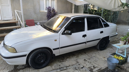 Nexia 1 yili 2001