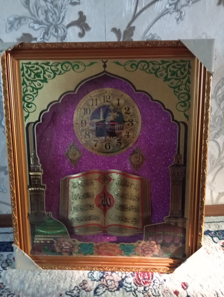 Devor soat imakkayi madinna rasmi tushirilgan yangidek