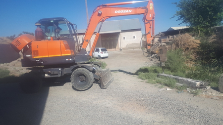 экскаватор doosan 55w  калёсный мини сотилади