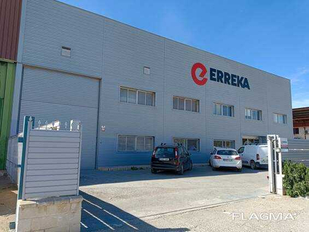 Автоматический привод для секционных ворот Erreka. Испания