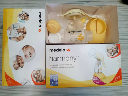 Молокоотсос MEDELA  ручной двухфазный,