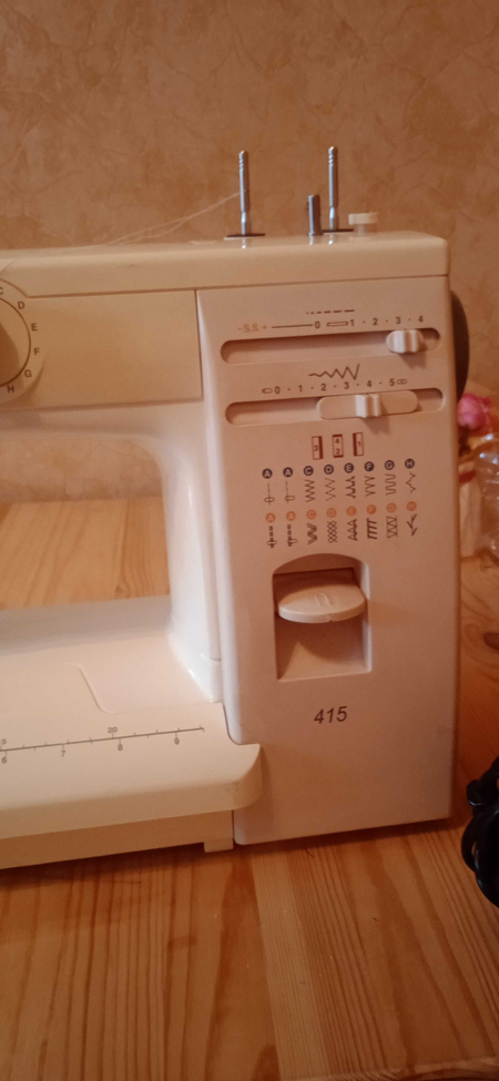 Швейная машинка Janome 415