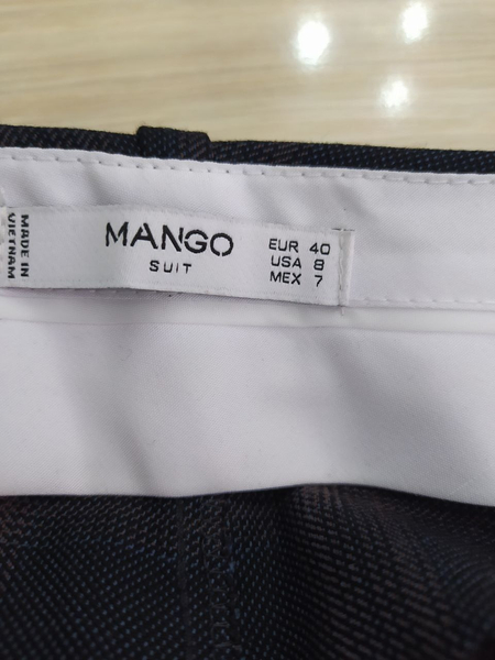 Брюки в клетку от Mango