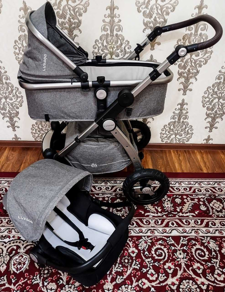 Фирменный коляска от фирмы LUX MOM 3 в 1