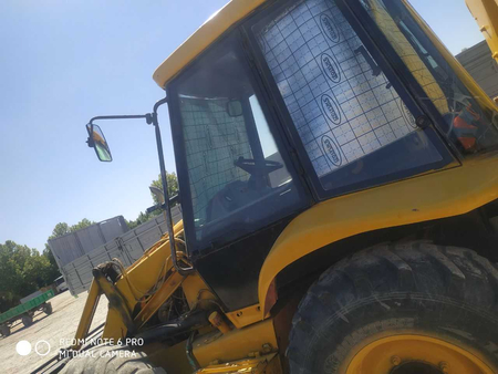 Экскаватор погрузчик JCB 4CX 14H2WM