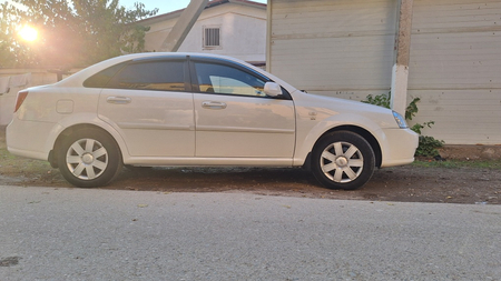 Lacetti 1.8.          ..