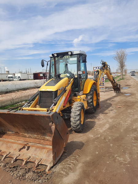 New holland b110b Tezda sotiladi xolati zor kam ishlagan