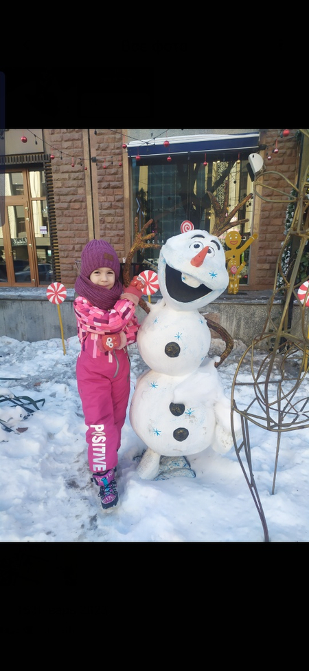 Яркий зимний комбинезон для девочки 5-7л