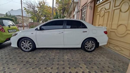 Tayota.1.8 aftamat.holati ideal.kicikina petno bilimidigan.rashod.8ta