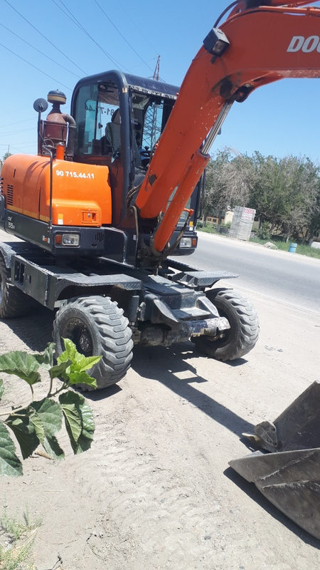экскаватор doosan 55w  калёсный мини сотилади