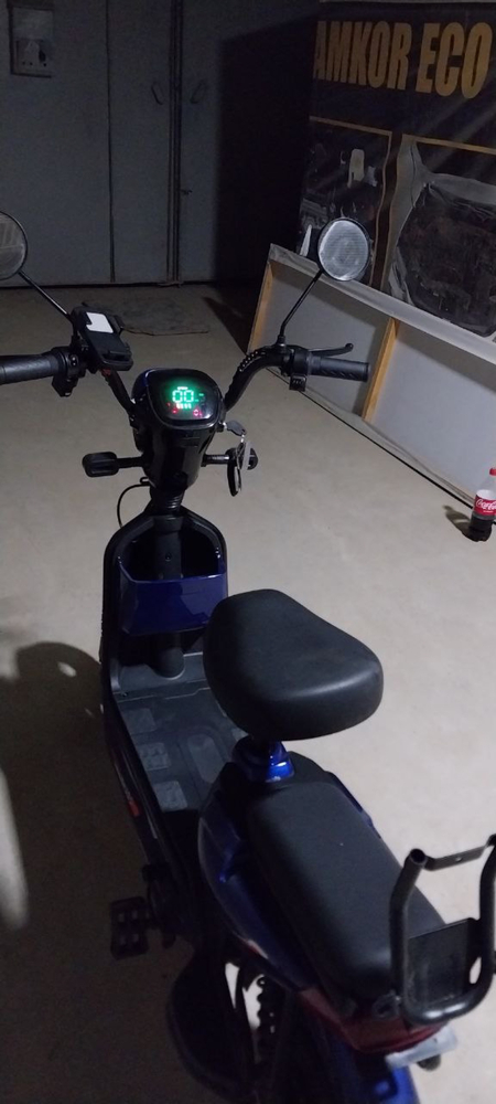 Elektroskuter naxtga