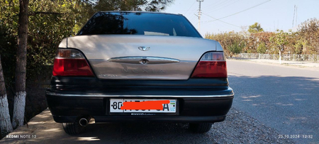 Neksiya 1 sons 1998 yil