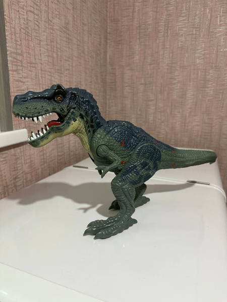 Игрушка динозавр