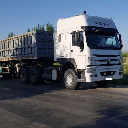 Тягач SINOTRUK HOWO A6 ва прицеп.