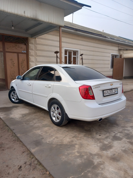 Lasetti 1.8 yurgani xalol