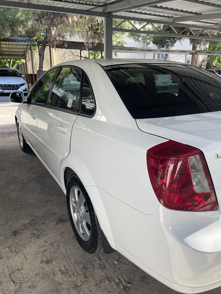 Lacetti gentra белая