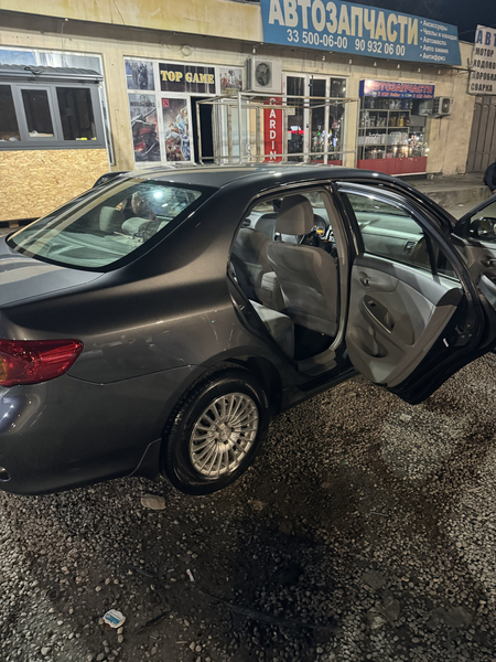 Tayota carolla xl 1.8 mator ideal holatda 100 min toza halol prabeg