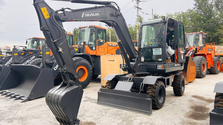 Колёсный экскаватор DEVELON DX60WN (DOOSAN)