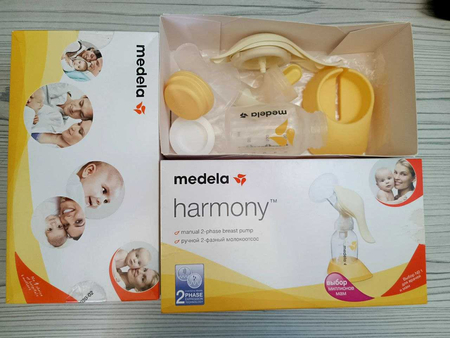 Молокоотсос MEDELA  ручной двухфазный,