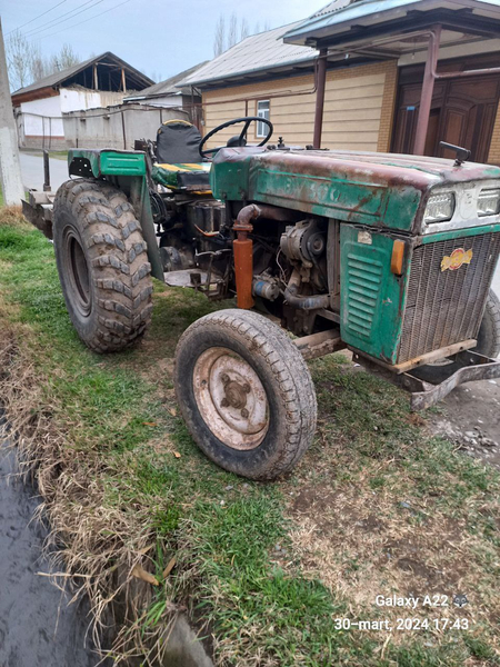 BY 300 traktori  5500$ Manzil Andijon agrigatlari bor