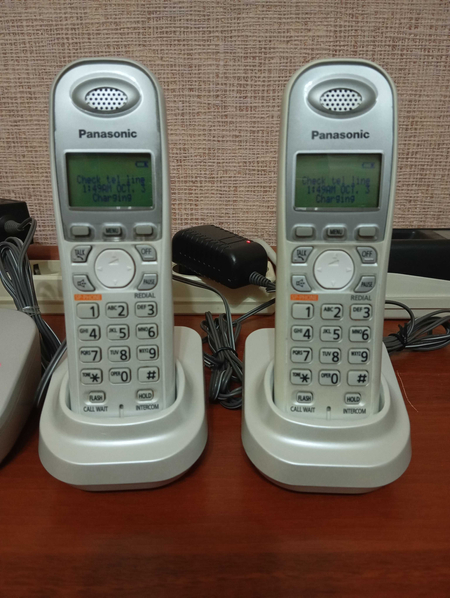 Продам радиотелефон PANASONIC три трубки на один телефонный номер.