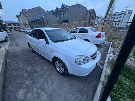 Lasetti 1.8 mexanika uzimni moshinam oq gaz bor 3pk