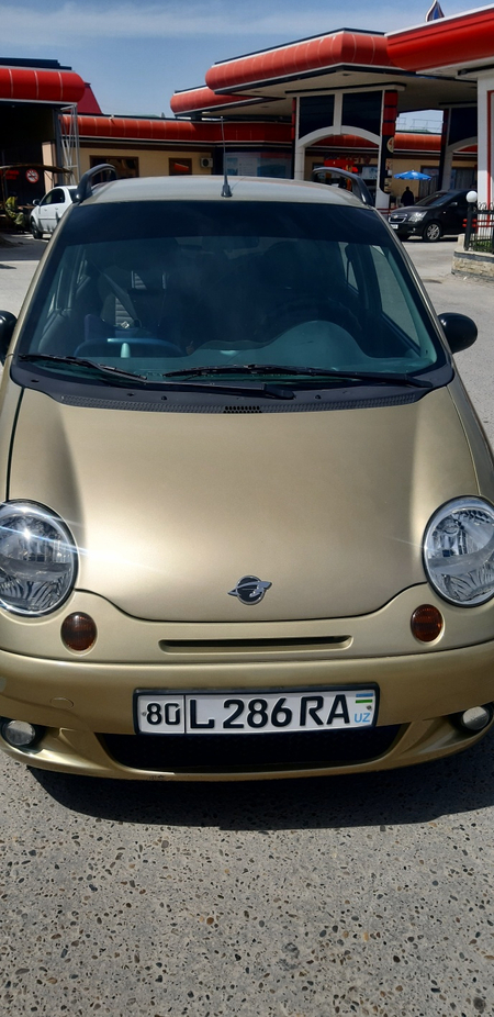 Matiz 3  megicar magnitol rul navarotlari bor 2009 yil oladiganlar tel