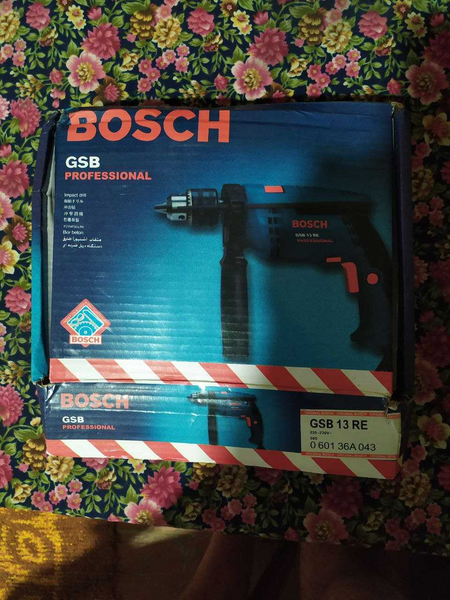 Дрель ударноя Bosch новая