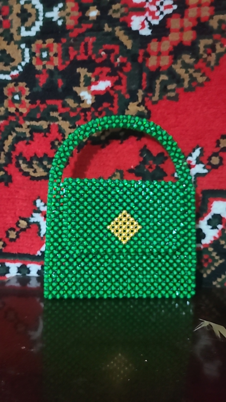Toshdan to\\\'qilgan sumkalar
