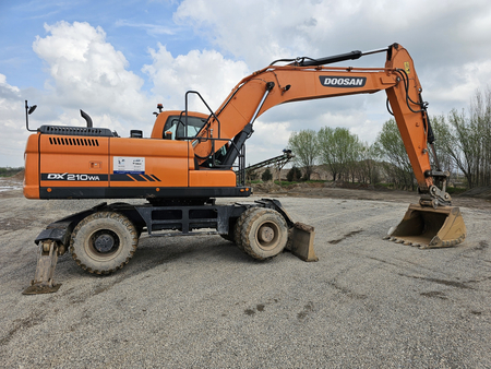 Doosan 210 ekiskovator