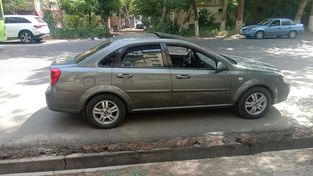 Лачетти 1.6 автомат. 2012 г.в. Метан 4 поколение. Балоны , аккумулятор
