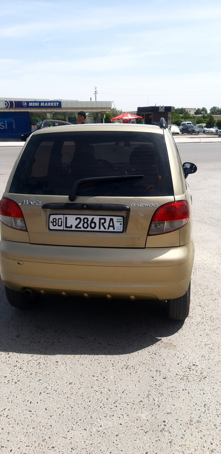 Matiz 3  megicar magnitol rul navarotlari bor 2009 yil oladiganlar tel
