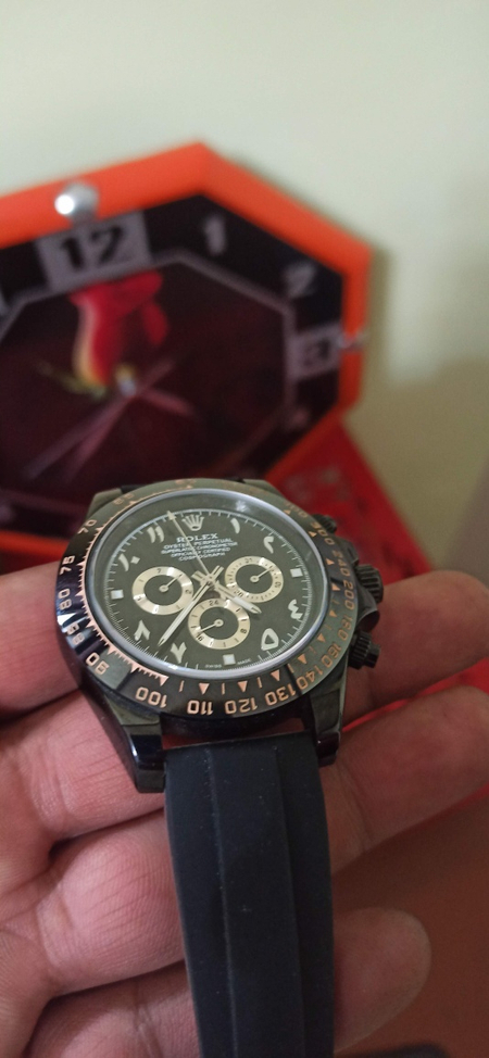 Rolex mexanika
Oyna safir
Korpus qora 
Kiramika
Remishok rezinka 
Hola
