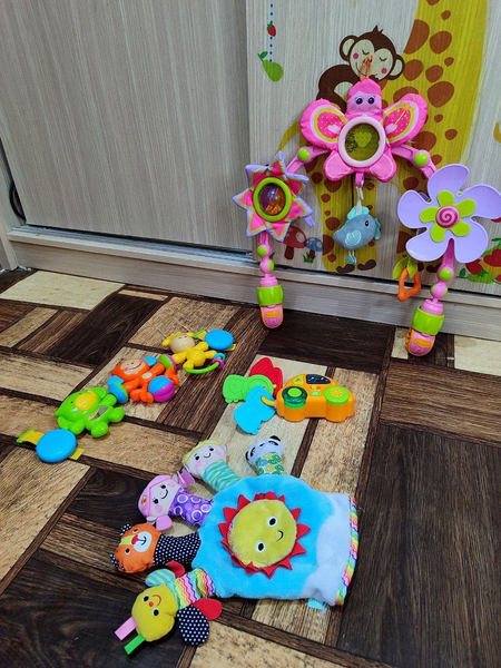 Игрушки на коляску