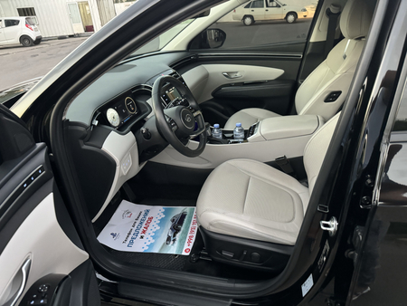 TUCSON FUUL 2litr qora toza 22yil oq salon