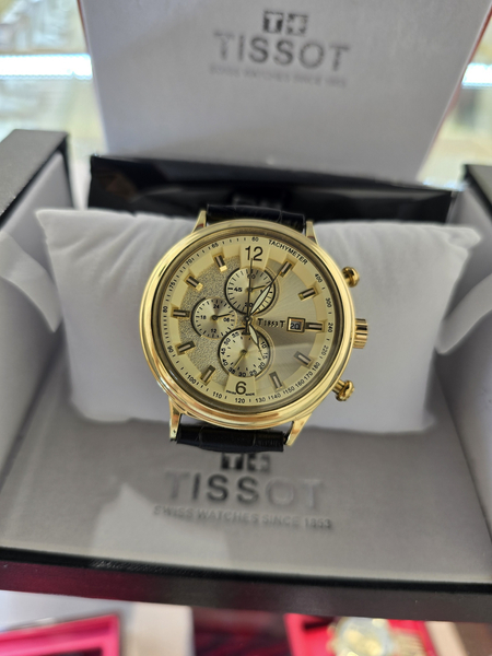 Продам золотые часы Tissot 750 пробы