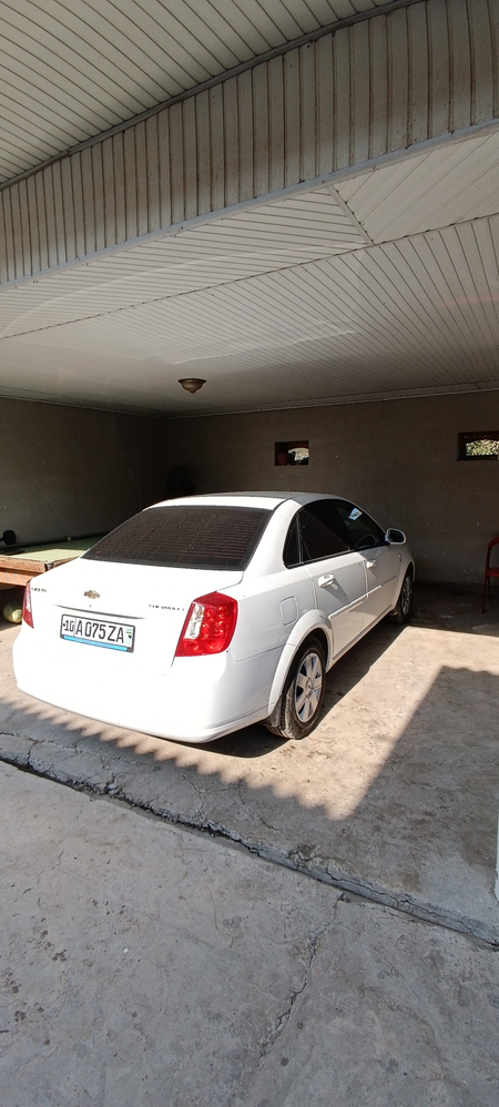 Lasetti 1.8 oq kraska toza moshina tiniq holatda