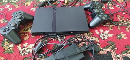 Playstation 2 slim 50ta o'yini bilan