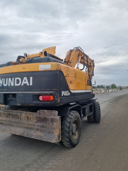 Hyundai R 140 w uzbda kam ishlagan
