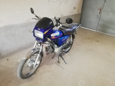 Moped honda kuzov juda baquvat