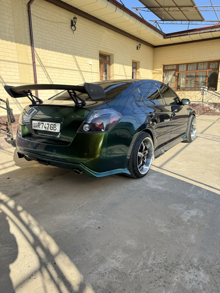 Nissan altima full pozitsiya
