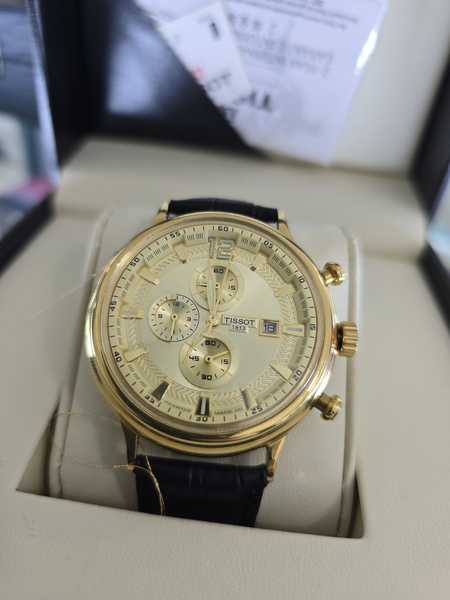 Продам золотые часы Tissot 750 пробы