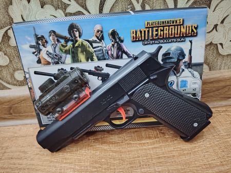 Игрушечный пистолет