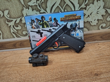 Игрушечный пистолет